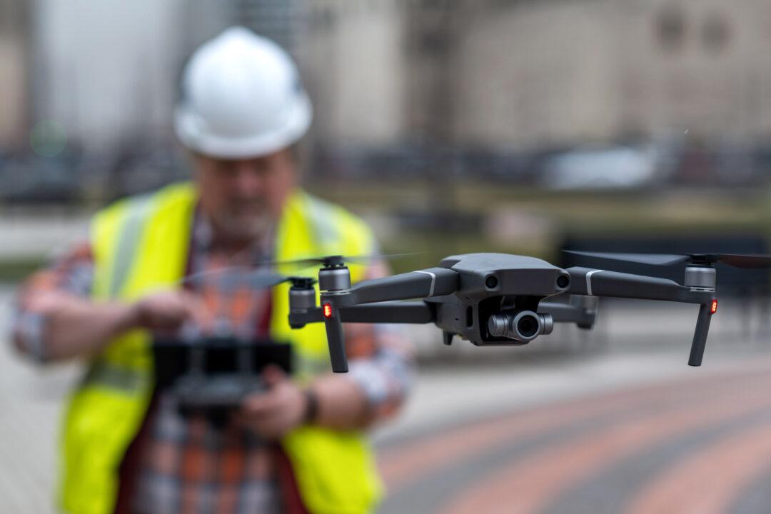 DTE Employee with Drone for Quest Story - Empowering Michigan