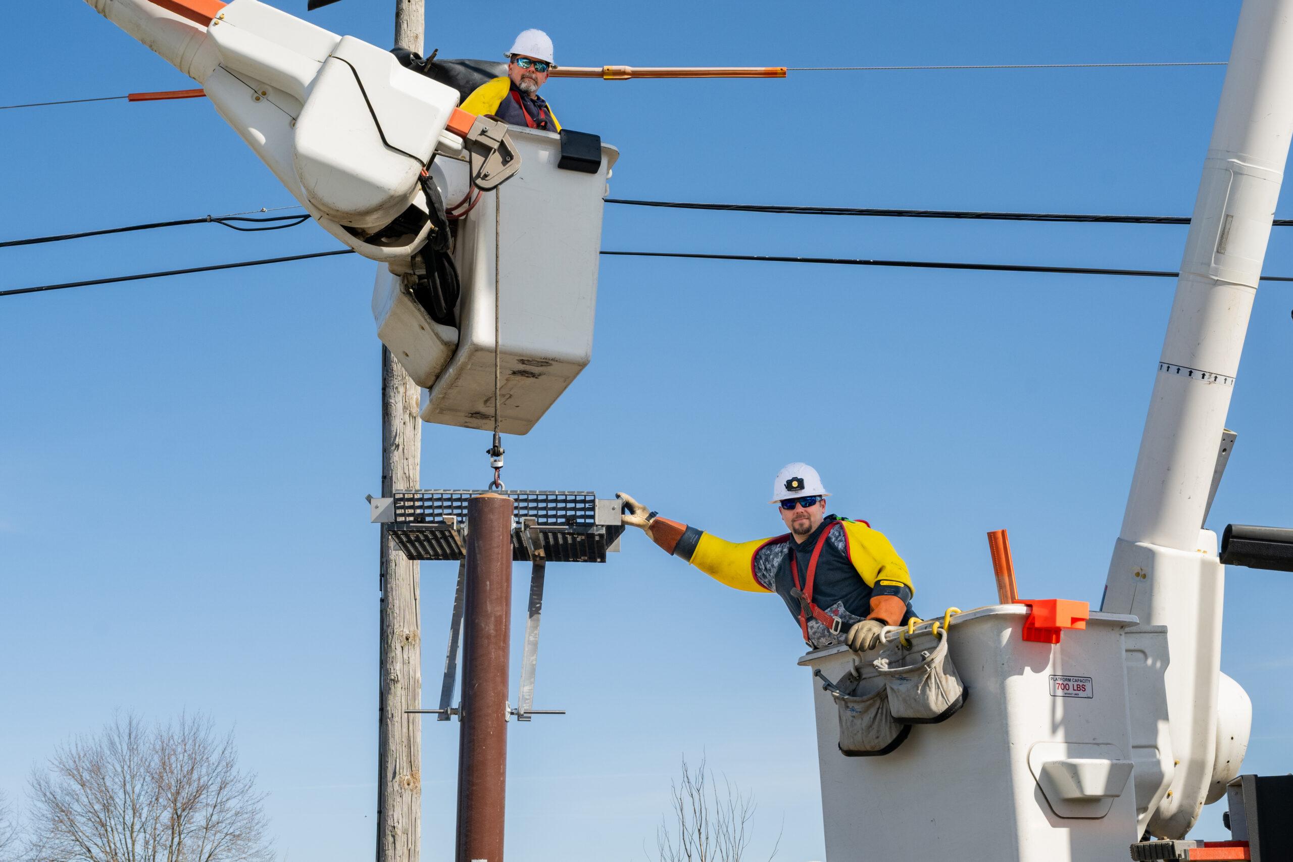 Osprey nesting platforms protect power and birds - Empowering Michigan