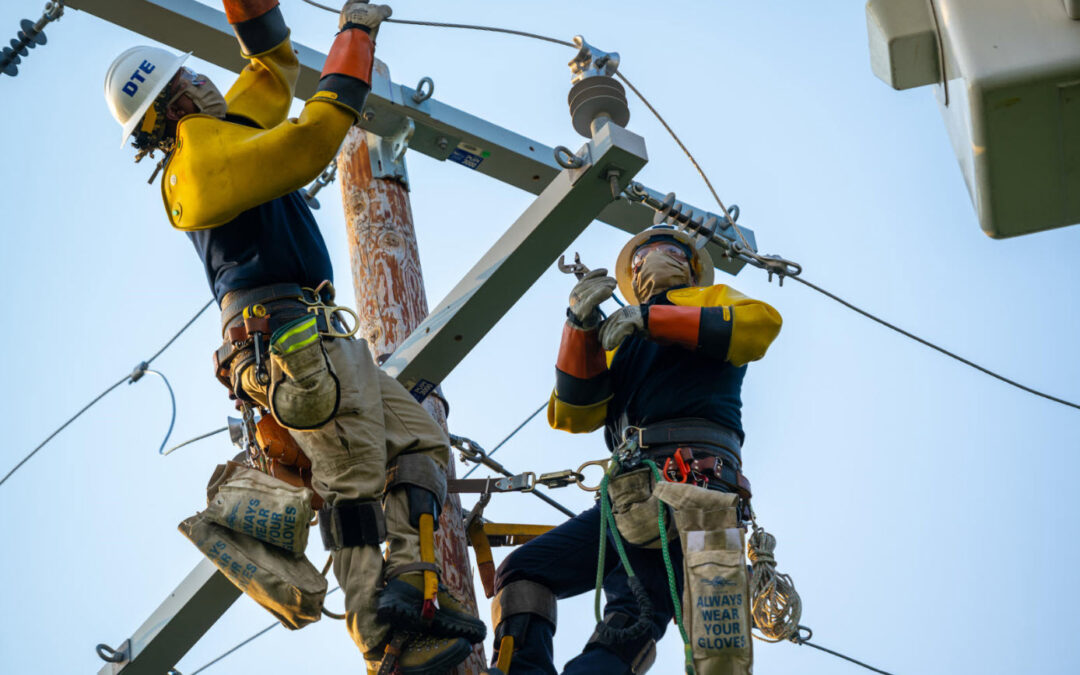 Linemen working - Empowering Michigan