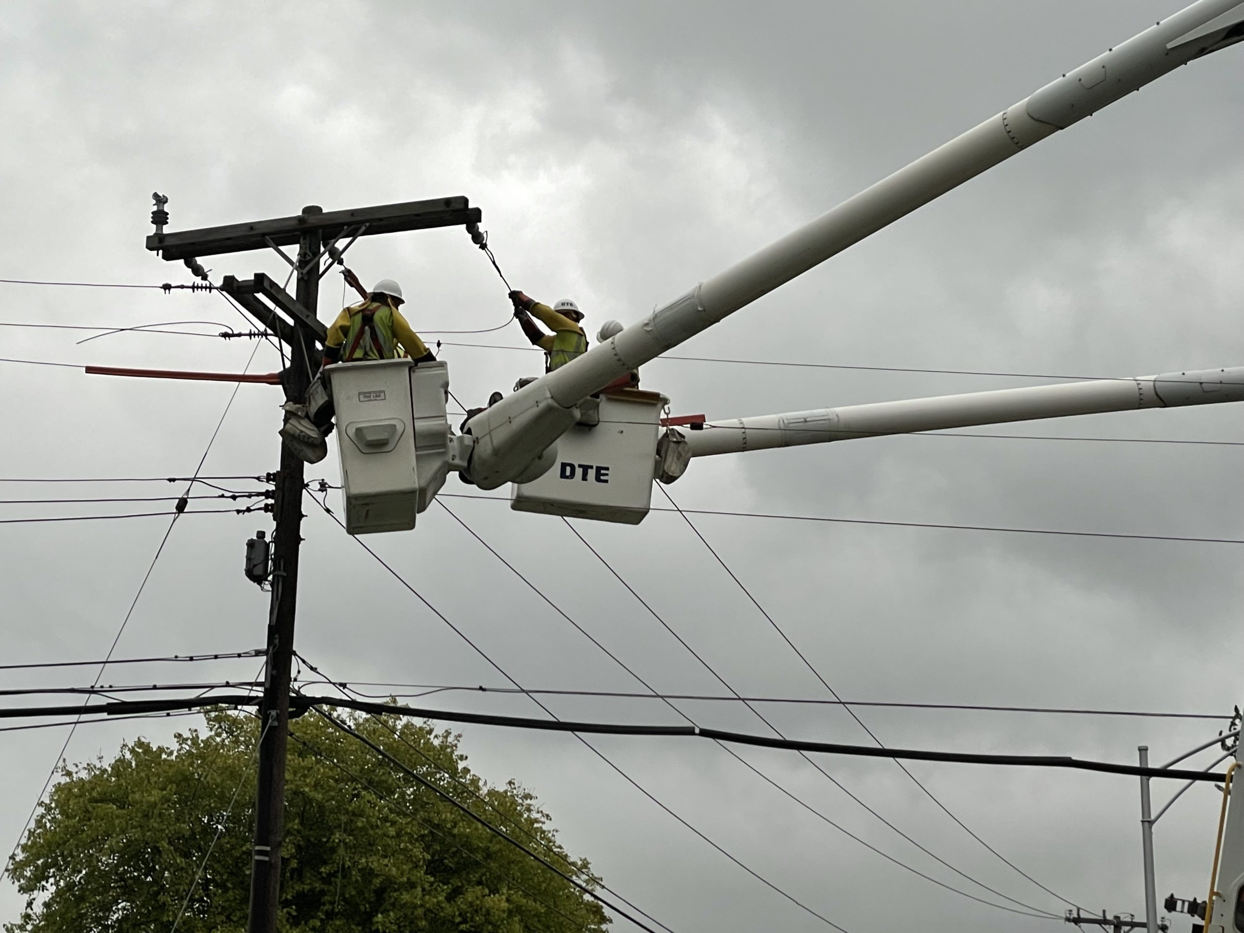 Overhead, underground crews work together to provide reliable power in ...